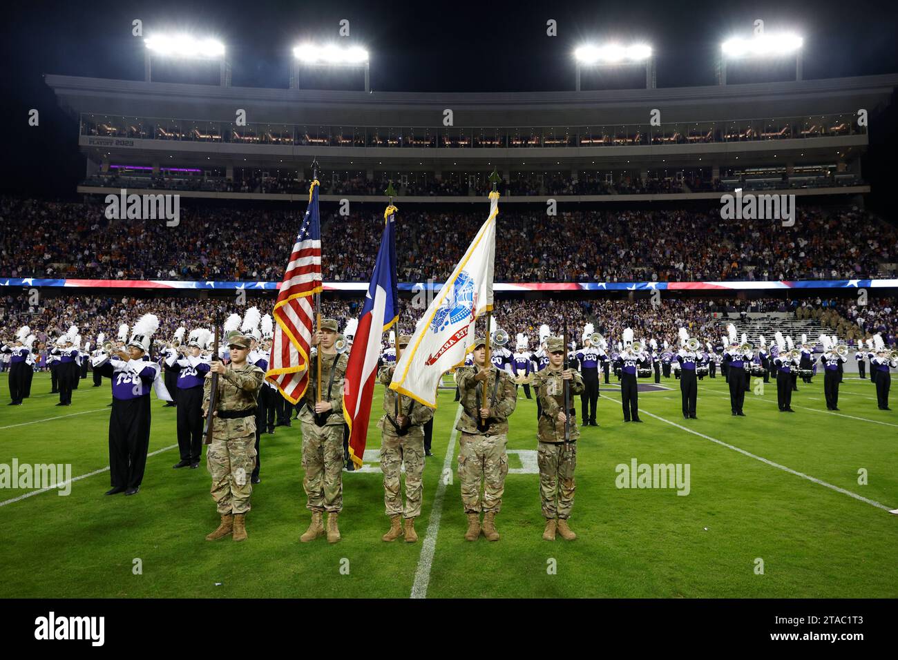 TCU's marching band and color guard during the national anthem n a ...