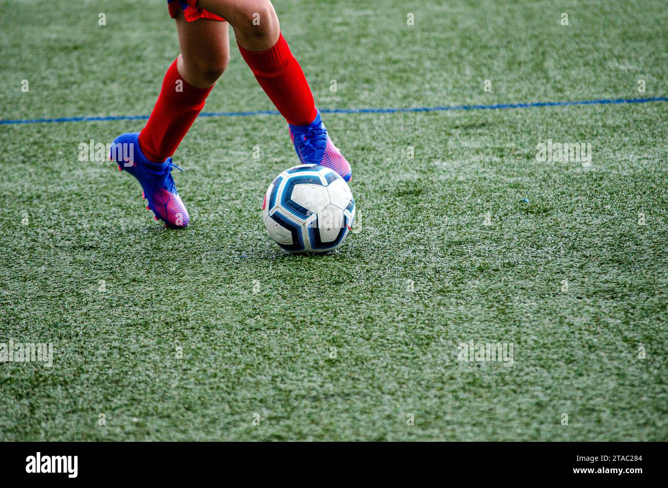 detail of a football player's legs with the ball Stock Photo - Alamy