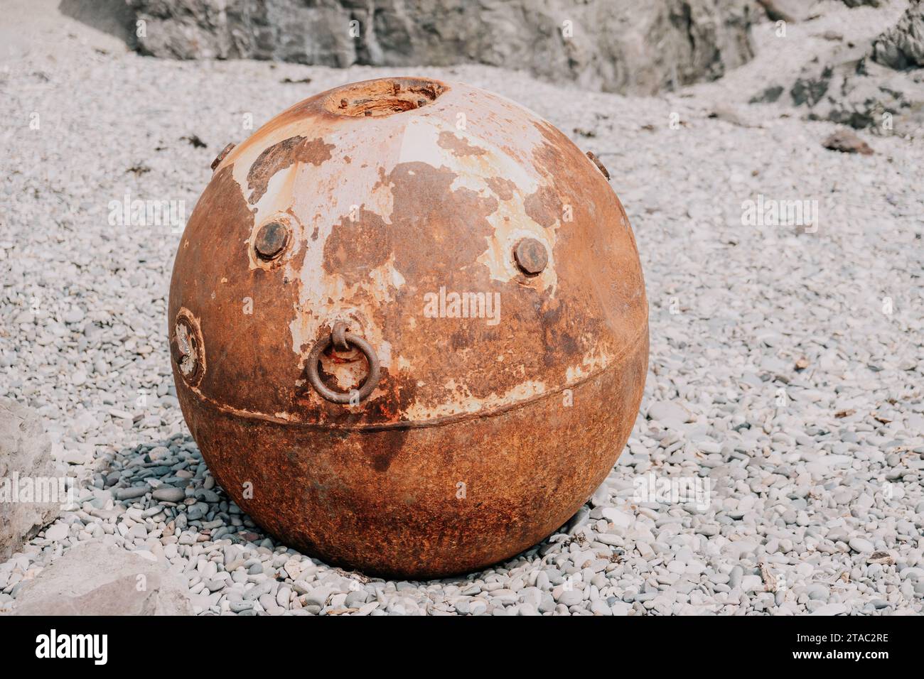 Old rusty sea mine on the beach Stock Photo - Alamy