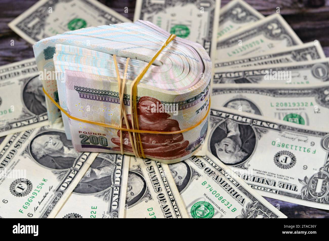 Folded Egyptian money banknote bills of 100, 200, 50 EGP LE one and two ...