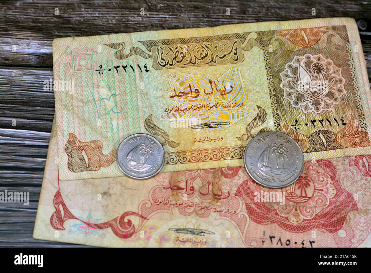 Qatari Money, money background of old coins and banknotes of riyals of ...