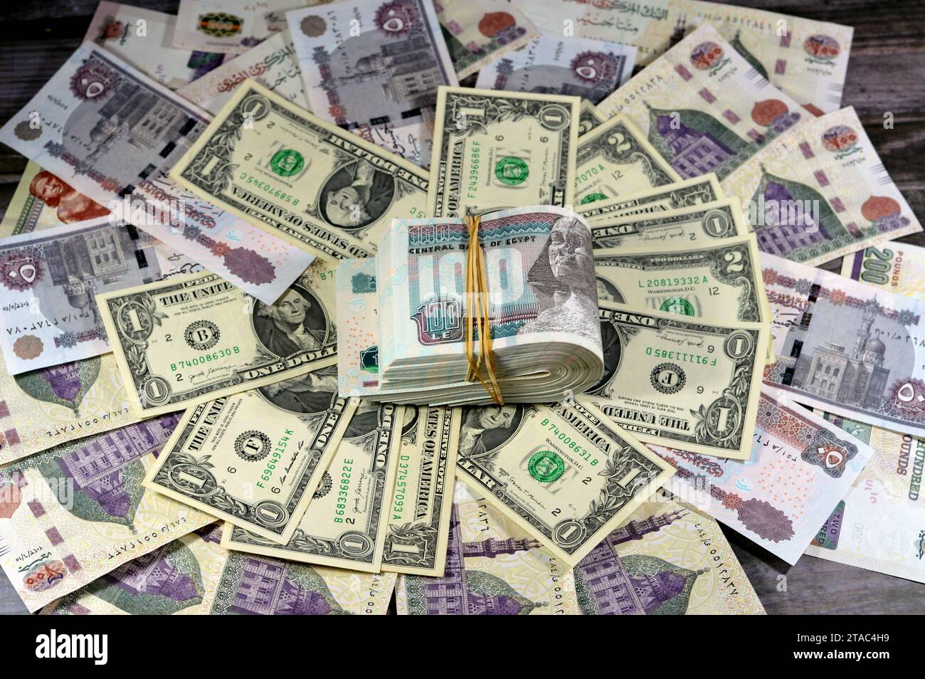 Folded Egyptian money banknote bills of 100, 200, 50 EGP LE one and two ...