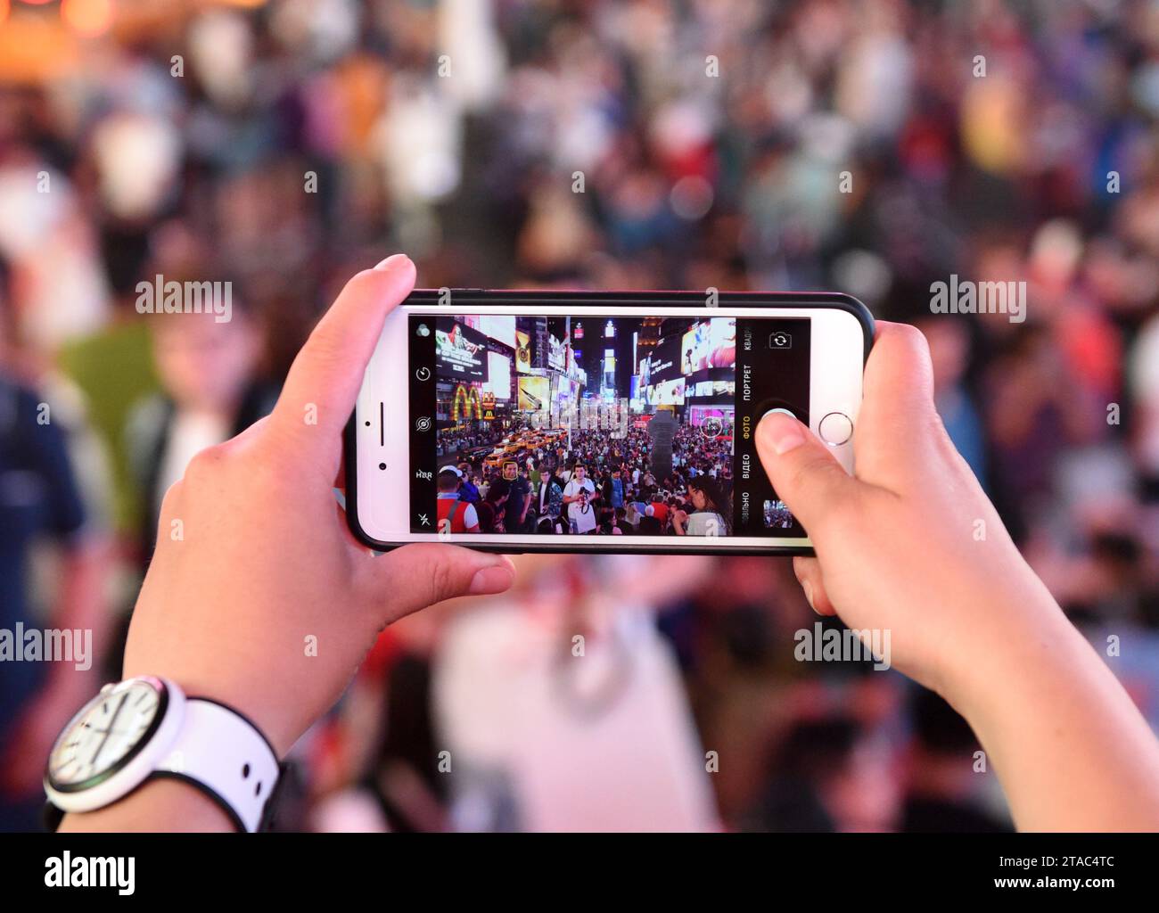 New York, USA - June 10, 2018: A woman makes a photo on his iPhone at ...