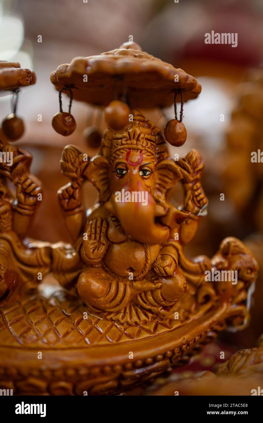 hindu god ganesha idol clay made from flat angle Stock Photo - Alamy