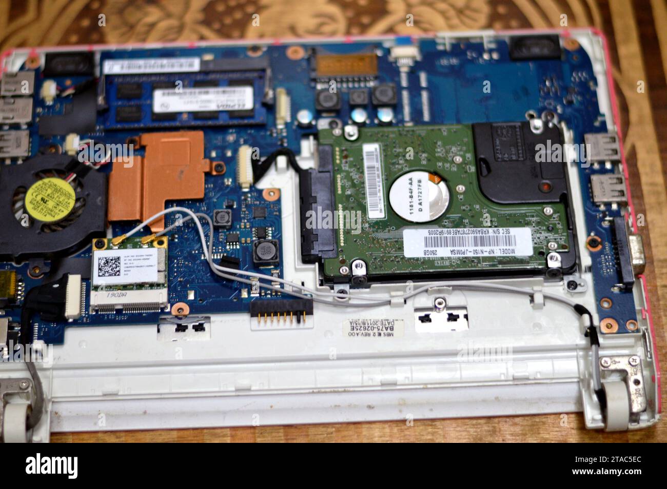 Cairo, Egypt, October 31 2023: maintenance of a laptop, fixing a problem in a computer hardware ...