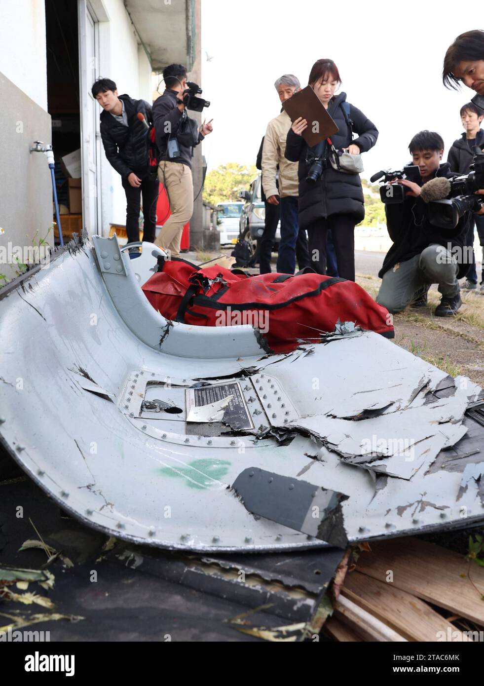 Debris, believed to be part of a US Osprey aircraft is confiscated by ...