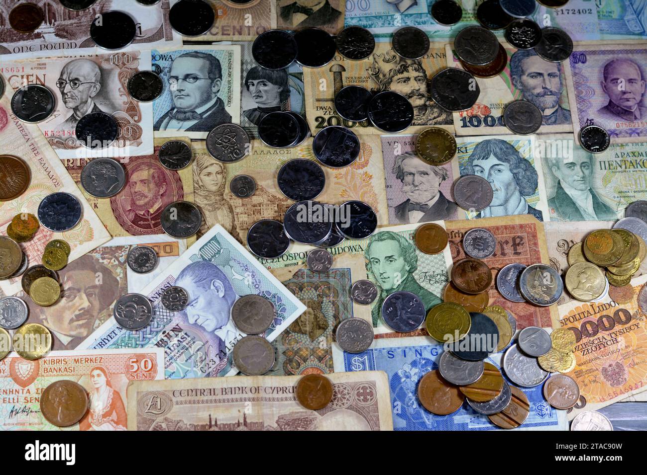 Old money currency of banknotes and coins from different countries of ...