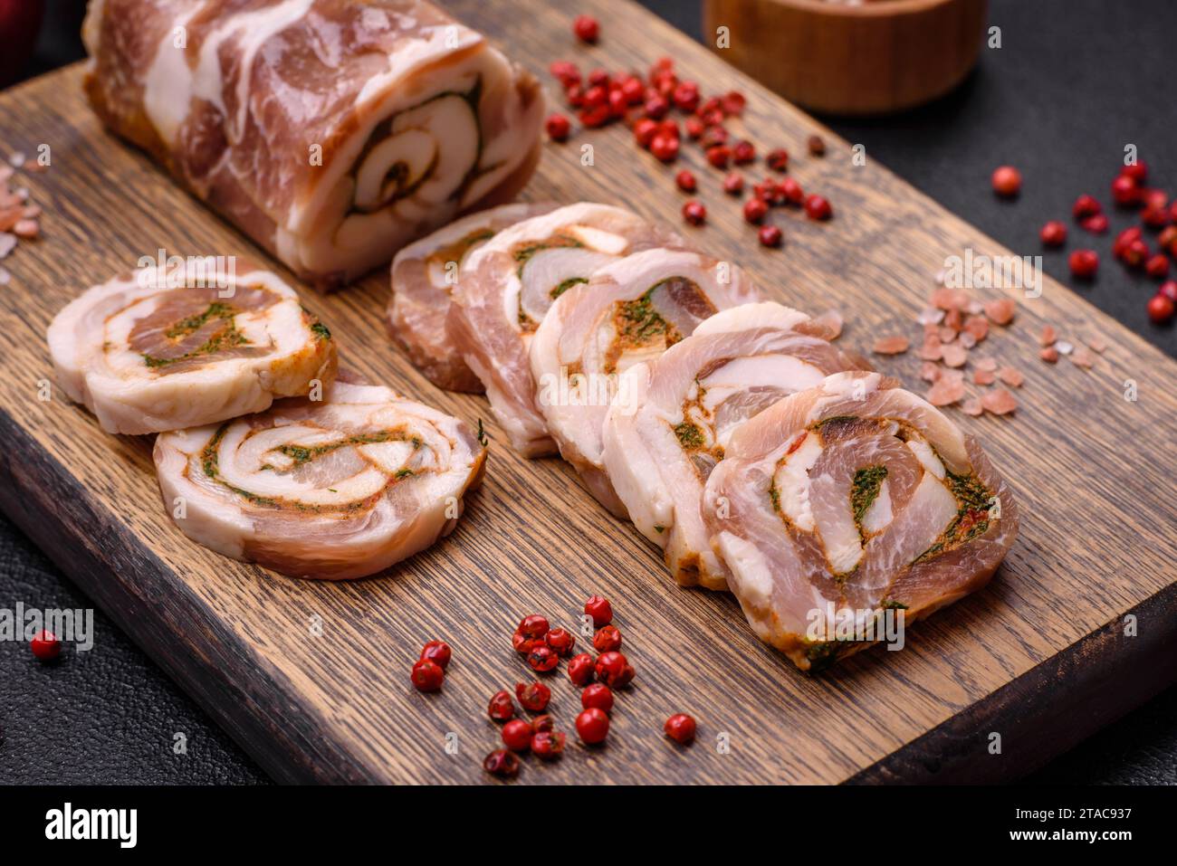 Delicious meatloaf with lard, salt, spices and herbs cut into slices on ...
