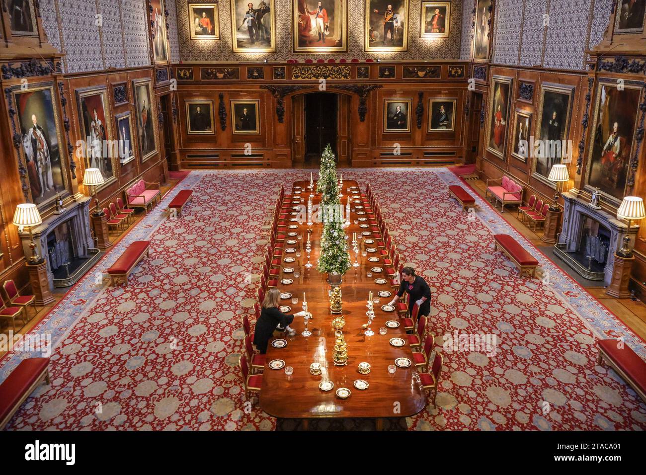 Windsor Castle, Berkshire 30 Nov 2023 the Waterloo Chamber, the 160-foot-long dining table will ...