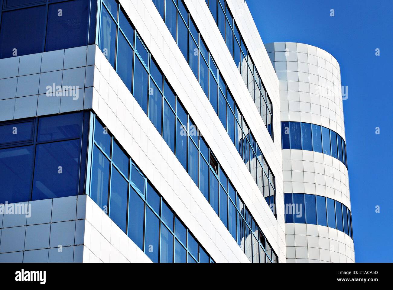 Modern office building in the city with windows and steel and aluminum ...