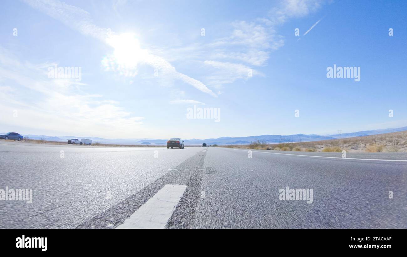 Daytime Road Trip: Nevada to California on HWY 15 Stock Photo - Alamy