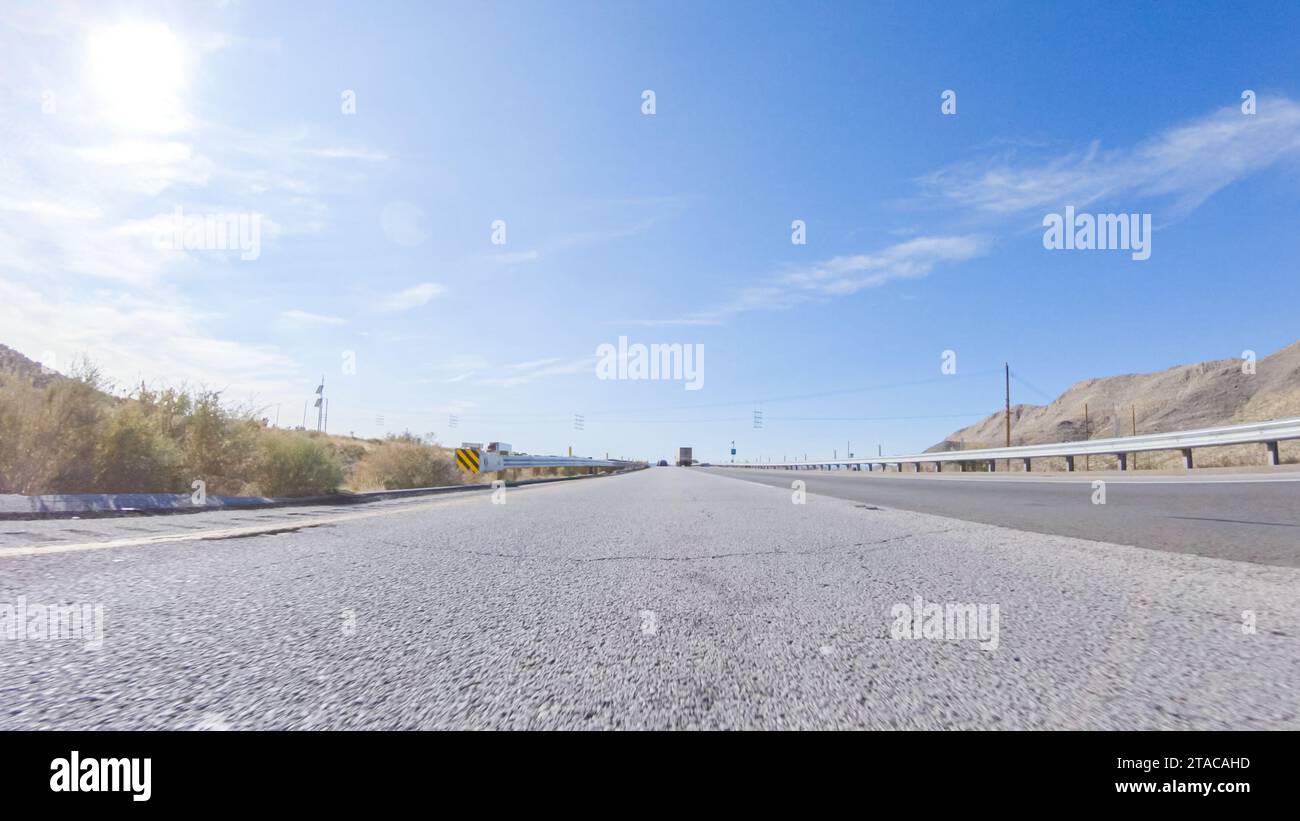 Daytime Road Trip: Nevada to California on HWY 15 Stock Photo - Alamy