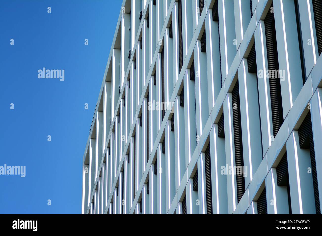 Modern office building in the city with windows and steel and aluminum ...