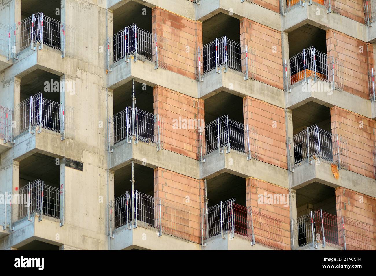 High rise building under construction. Installation of glass facade ...