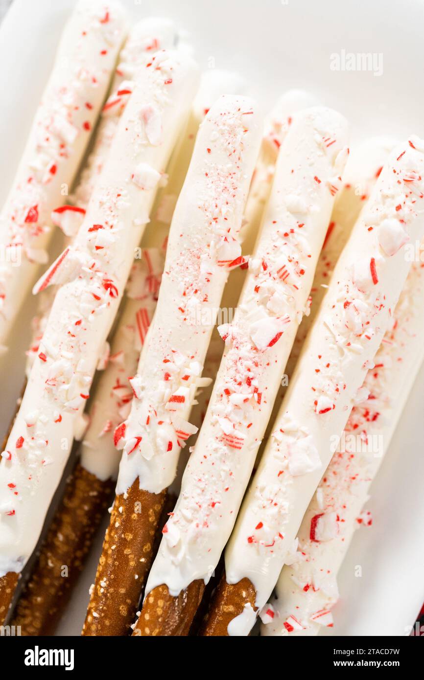 Candy cane chocolate covered pretzel rods Stock Photo - Alamy