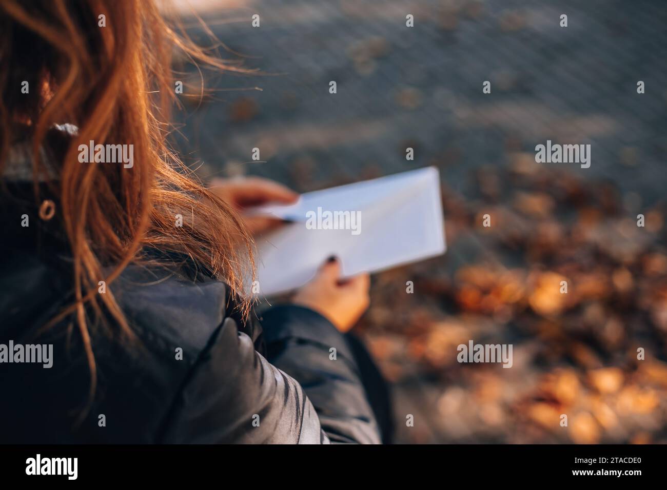 Girl opens a white envelope with a check. Payroll Check. Holding Salary ...