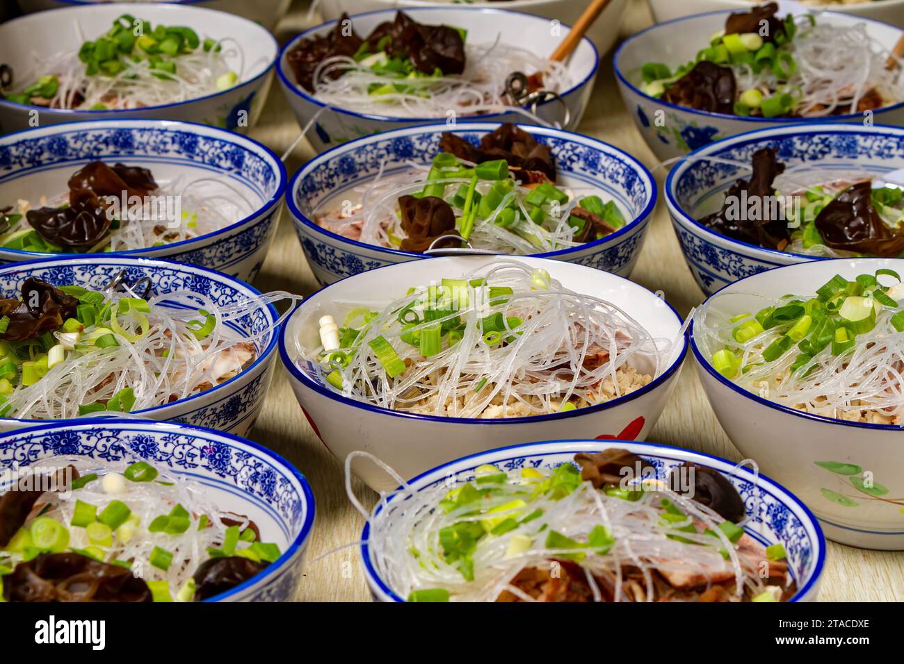 Food in street restaurants in the market street of Xian in China Stock ...