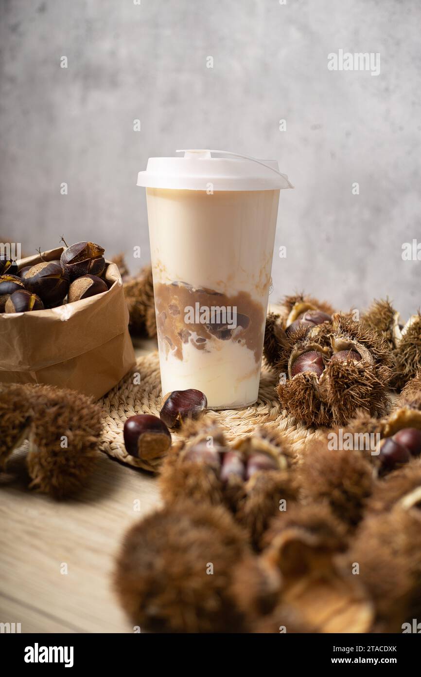 Take away glass of fresh chinese chestnut Juice topped with cheese ...