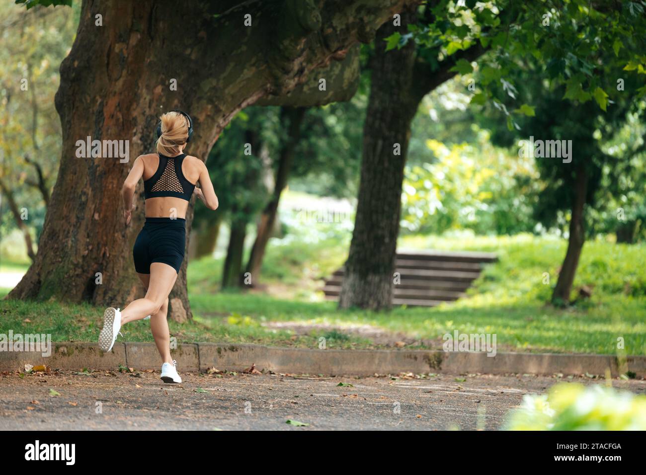 Blonde runner girl hi-res stock photography and images - Alamy