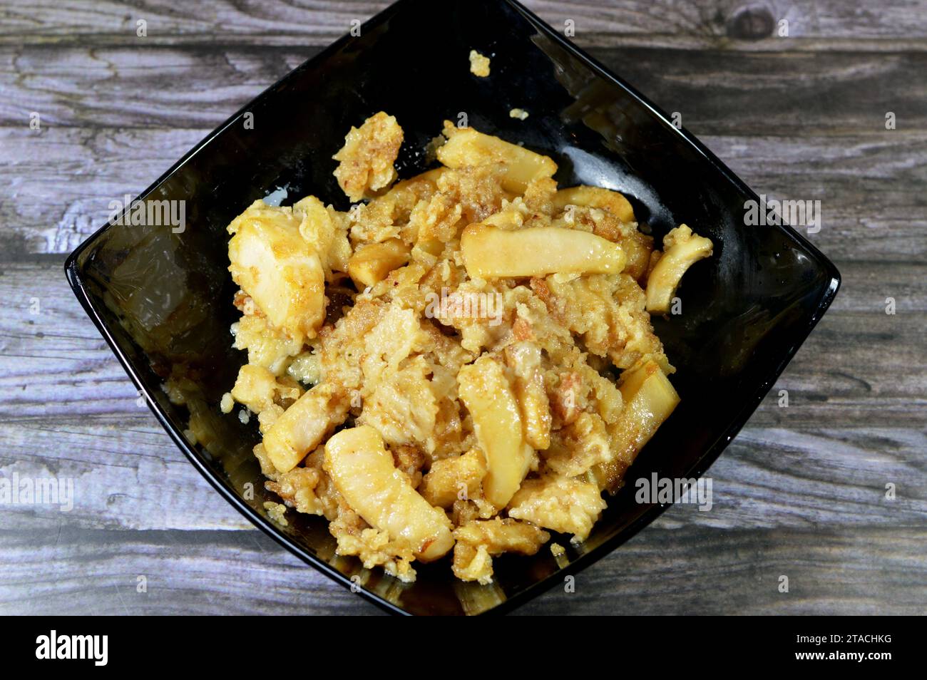 fried squid, a mollusc with an elongated soft body, large eyes, eight ...