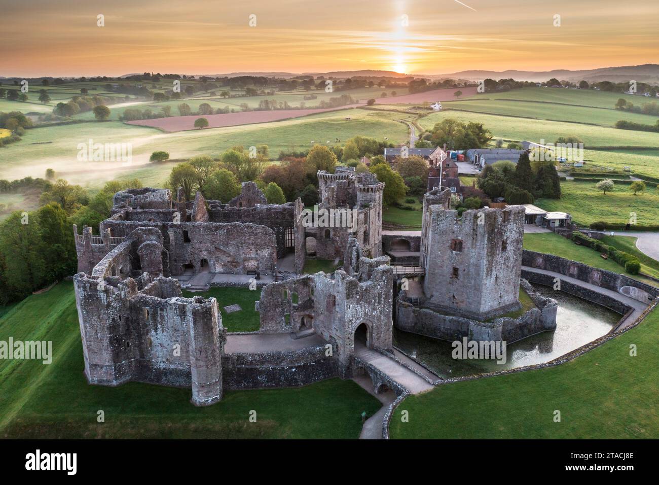 Aerial view of Raglan Castle at dawn, Raglan, Monmouthshire, Wales ...