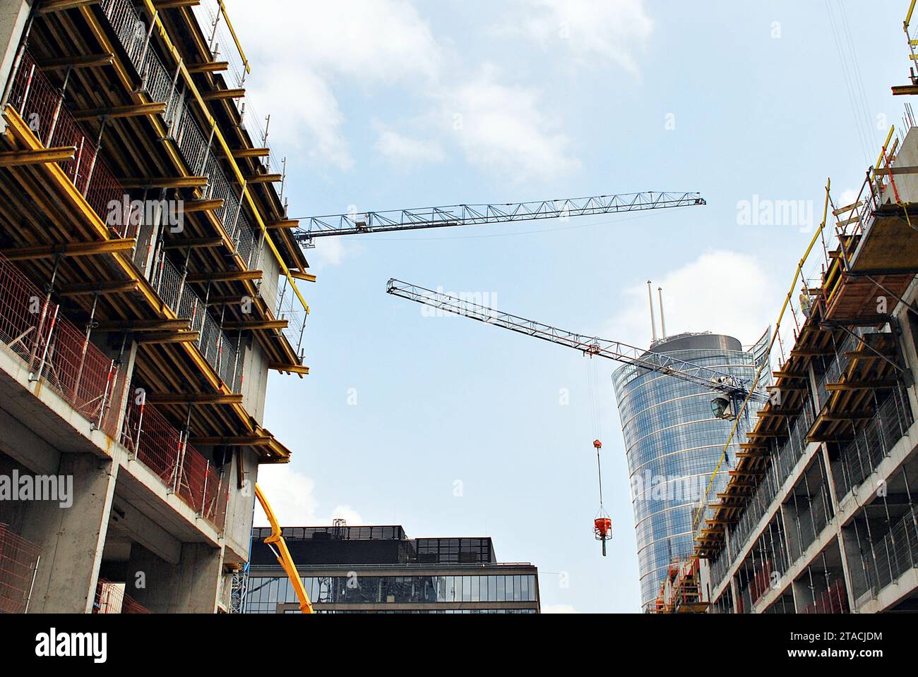 High rise building under construction. Installation of glass facade ...