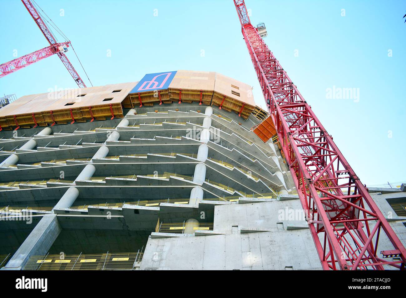 High rise building under construction. Installation of glass facade ...