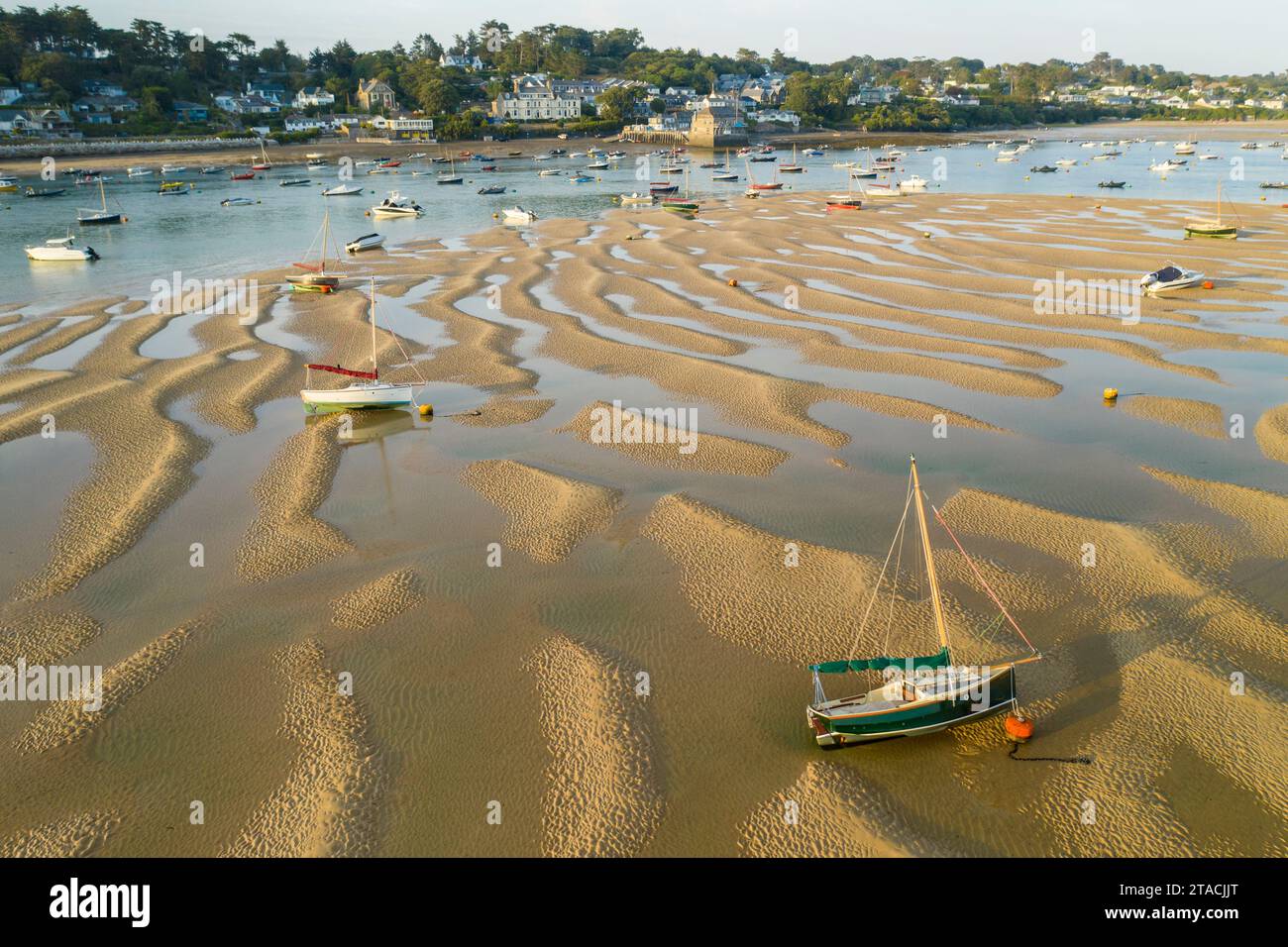 Aerial image of boats stranded on sand bar in the Camel Estuary near ...