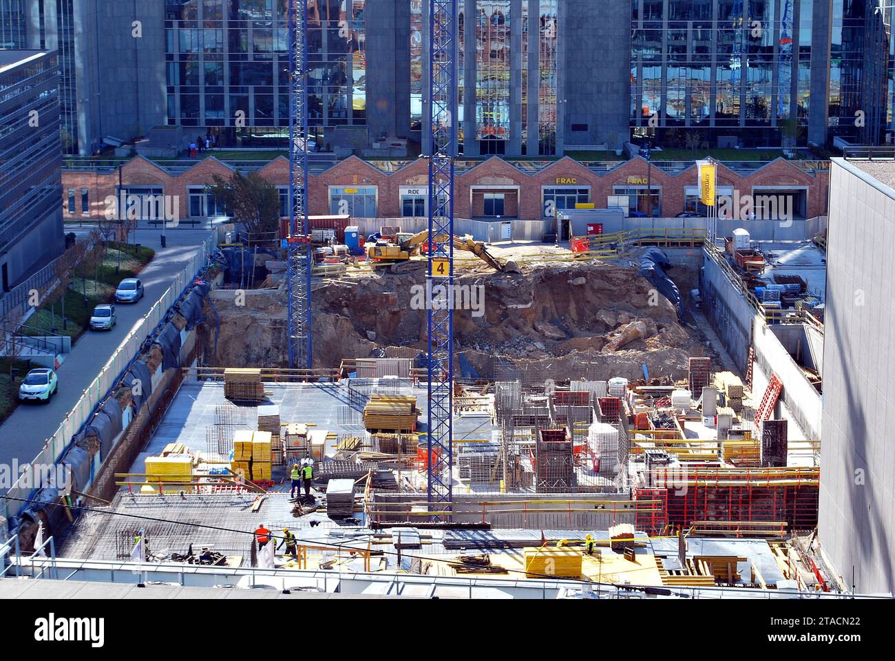 High rise building under construction. Installation of glass facade ...