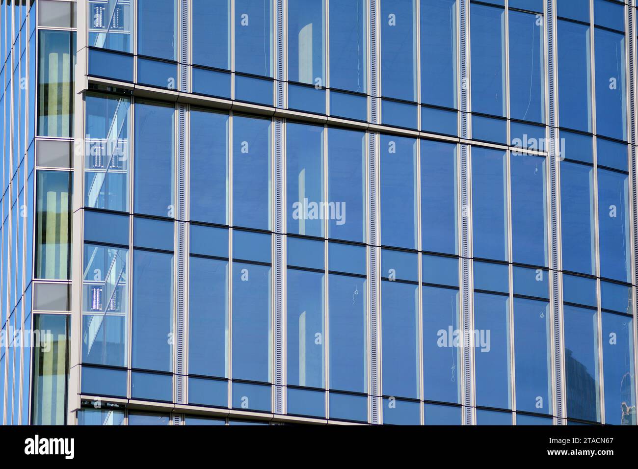 Fragment of glass and metal facade walls. Commercial office buildings ...
