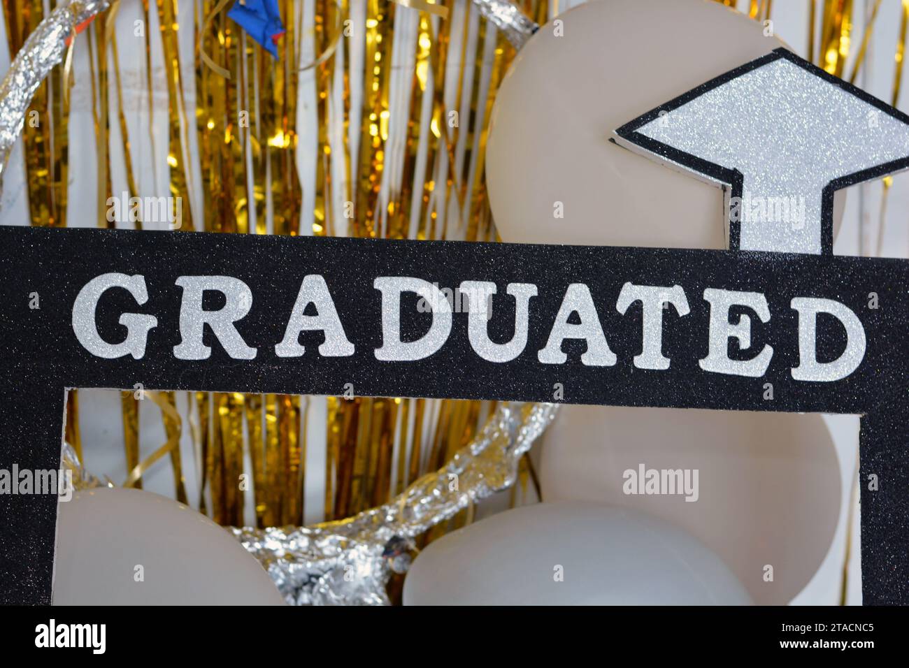 A frame with the word graduated for a graduation party, University ...