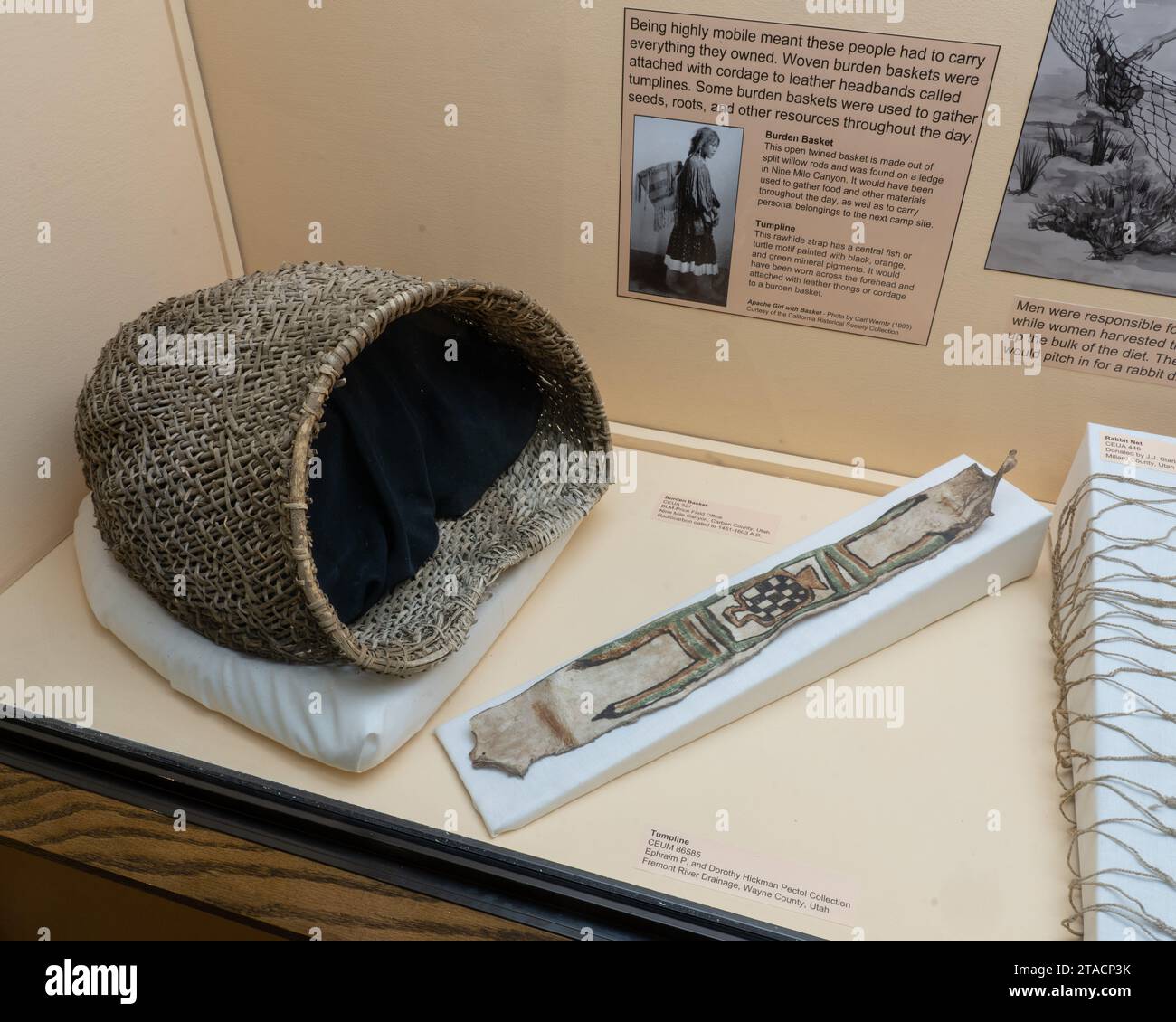 A Native American woven burden basket & painted leather tumpline in the ...