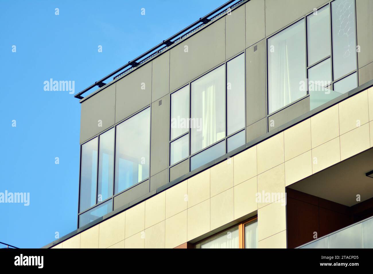 New apartment building with glass balconies. Modern architecture houses ...