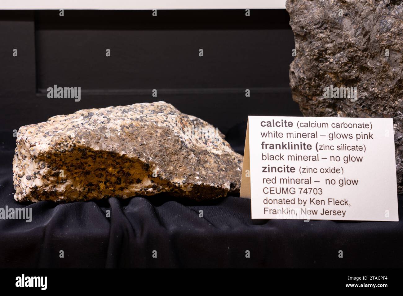 Franklinite, zincite & calcite minerals under normal light. USU Eastern ...