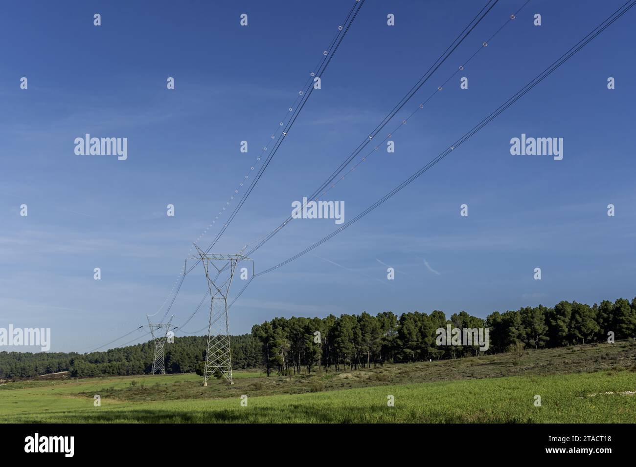 High voltage towers that carry cable lines Stock Photo - Alamy