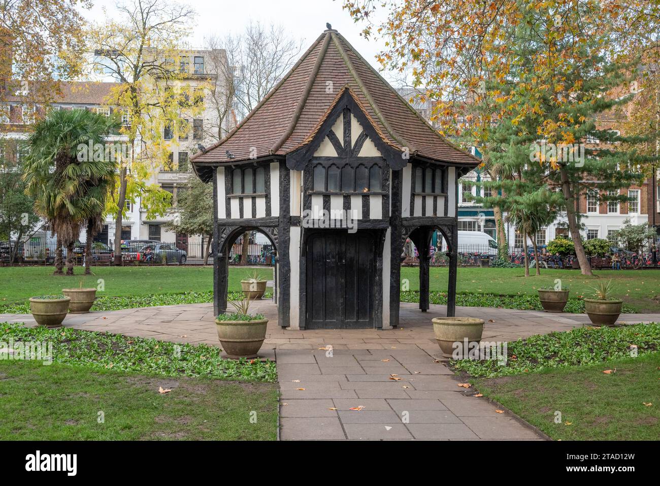 Soho Square park and gardens, London, with timber-framed mock market ...