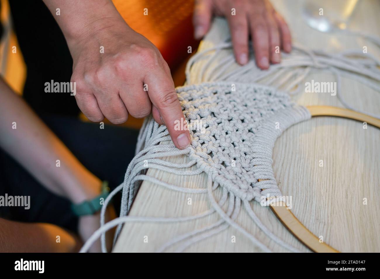 Making macrame, handmade workshop Stock Photo - Alamy