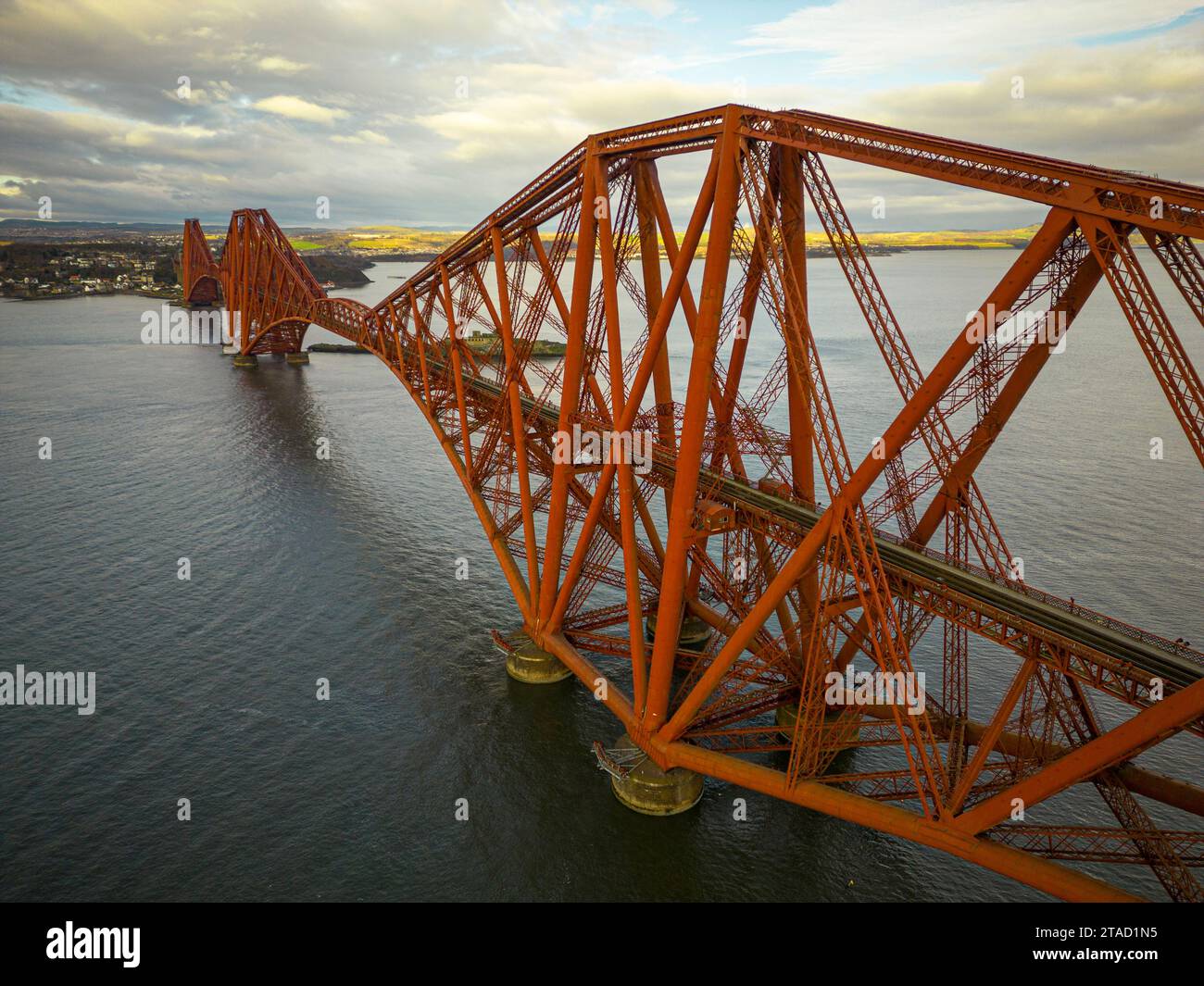 Aerial view of the Forth Bridge ( Forth railway bridge) crossing Firth of Forth at South ...