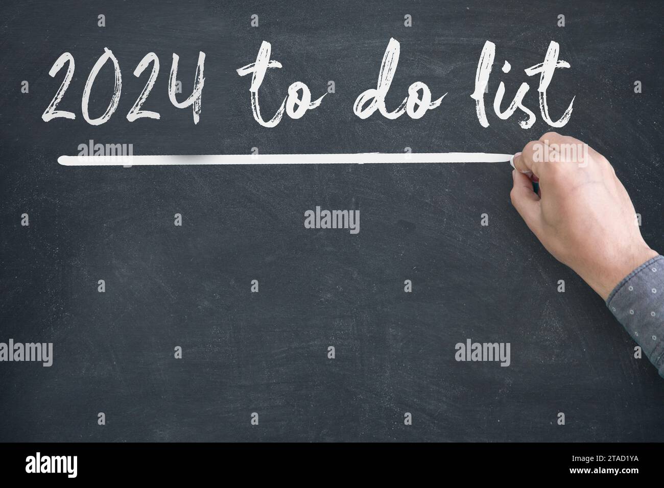 Close up of human hand writing 2024 New Year Resolution Check List on ...