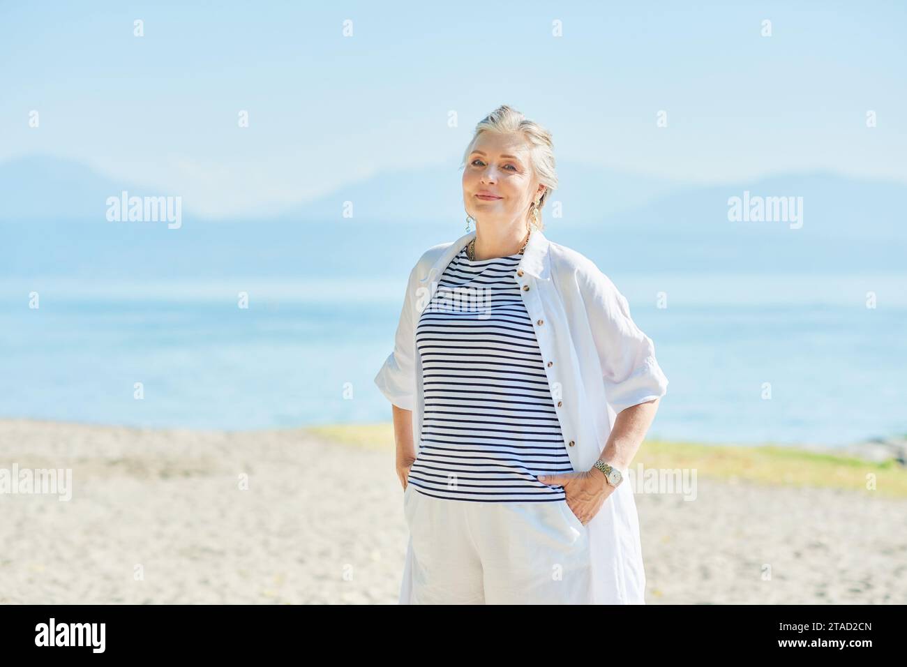 Outdoor summer portrait of happy and healthy mature 50 - 55 year old ...