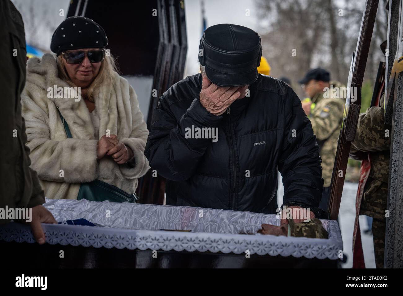 Funeral casket crying hi-res stock photography and images - Alamy