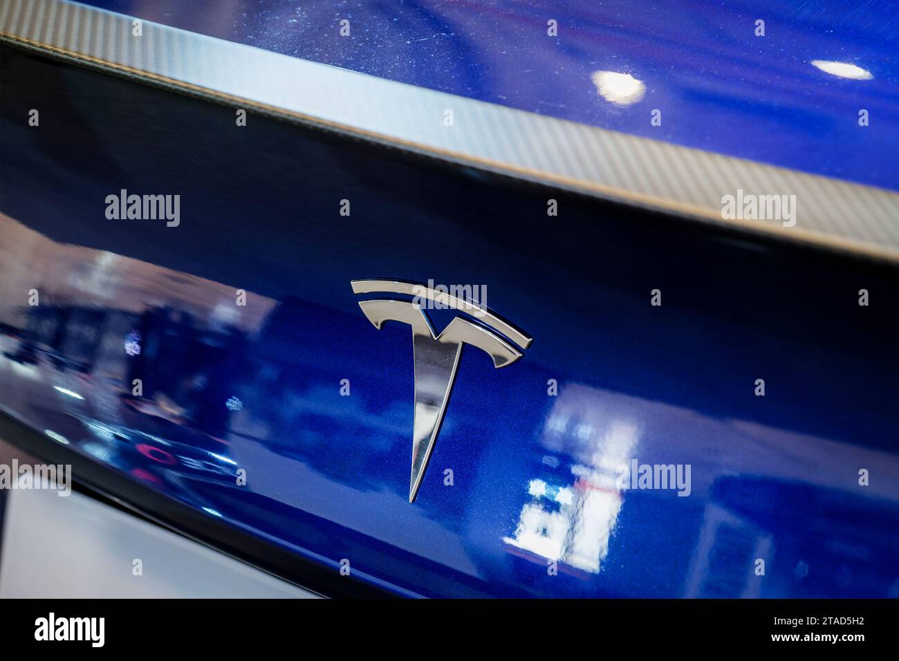Tesla electric car logo emblem close up Stock Photo - Alamy