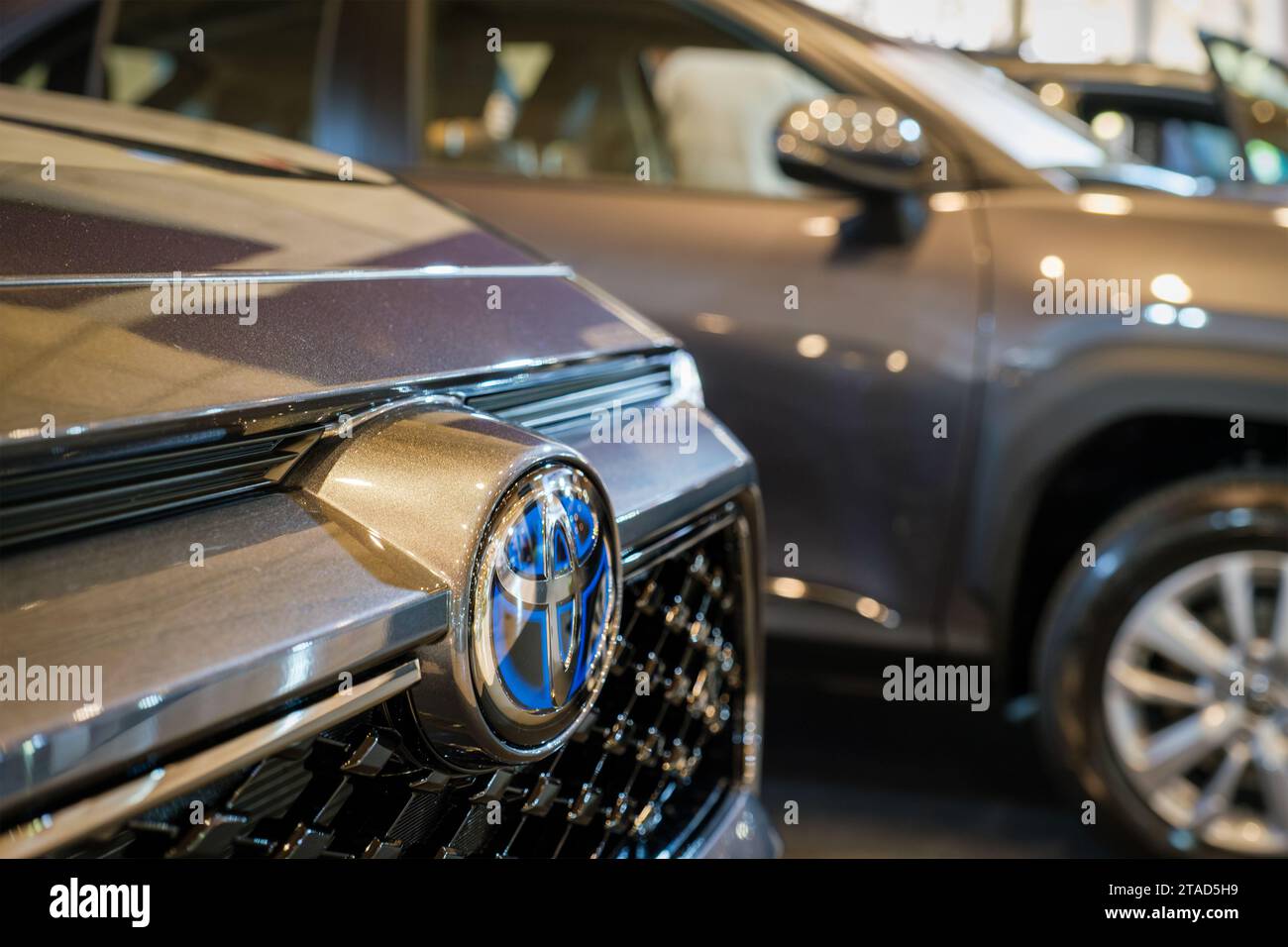 Toyota electric car logo emblem close up Stock Photo - Alamy