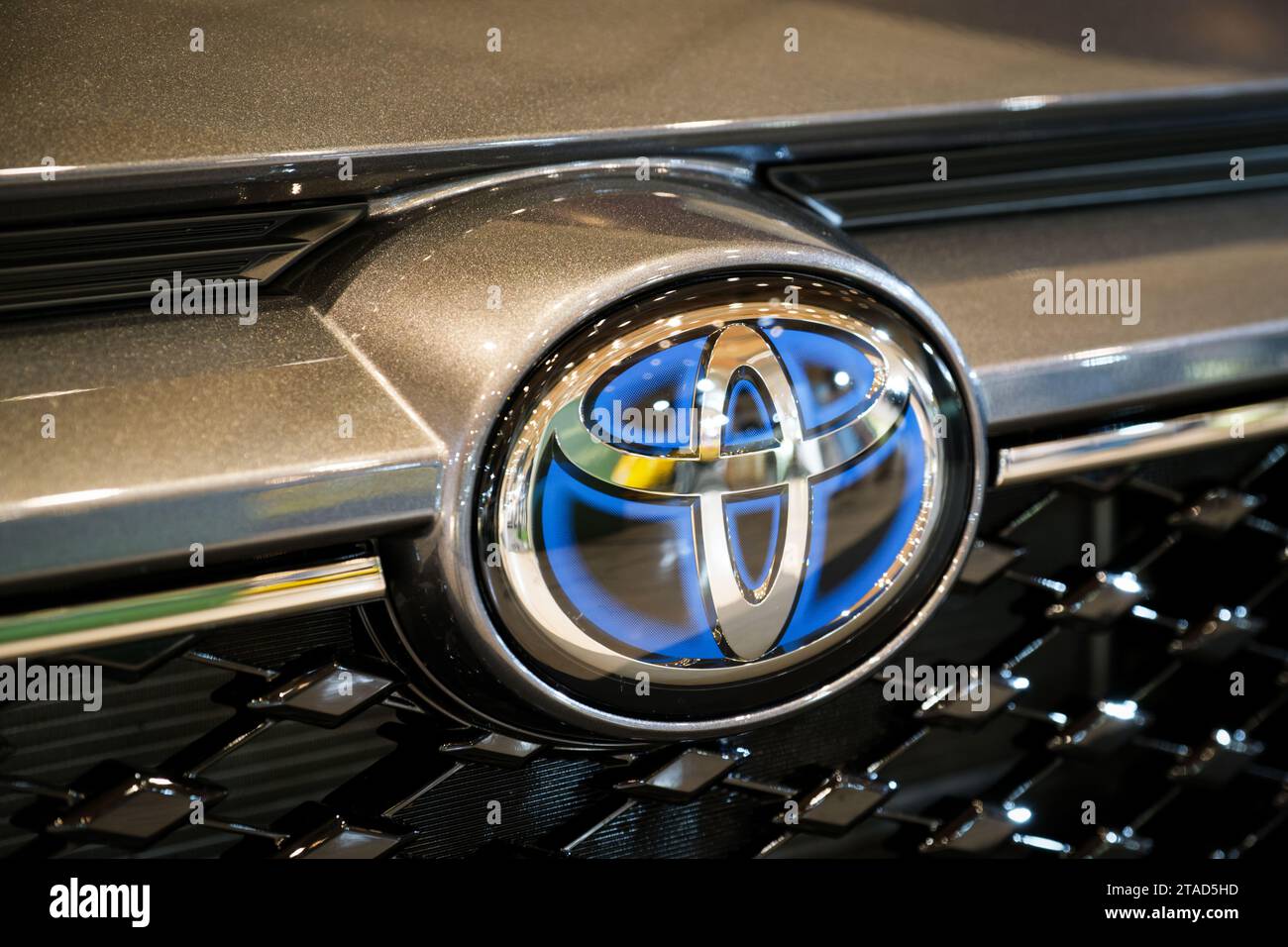 Toyota electric car logo emblem close up Stock Photo - Alamy
