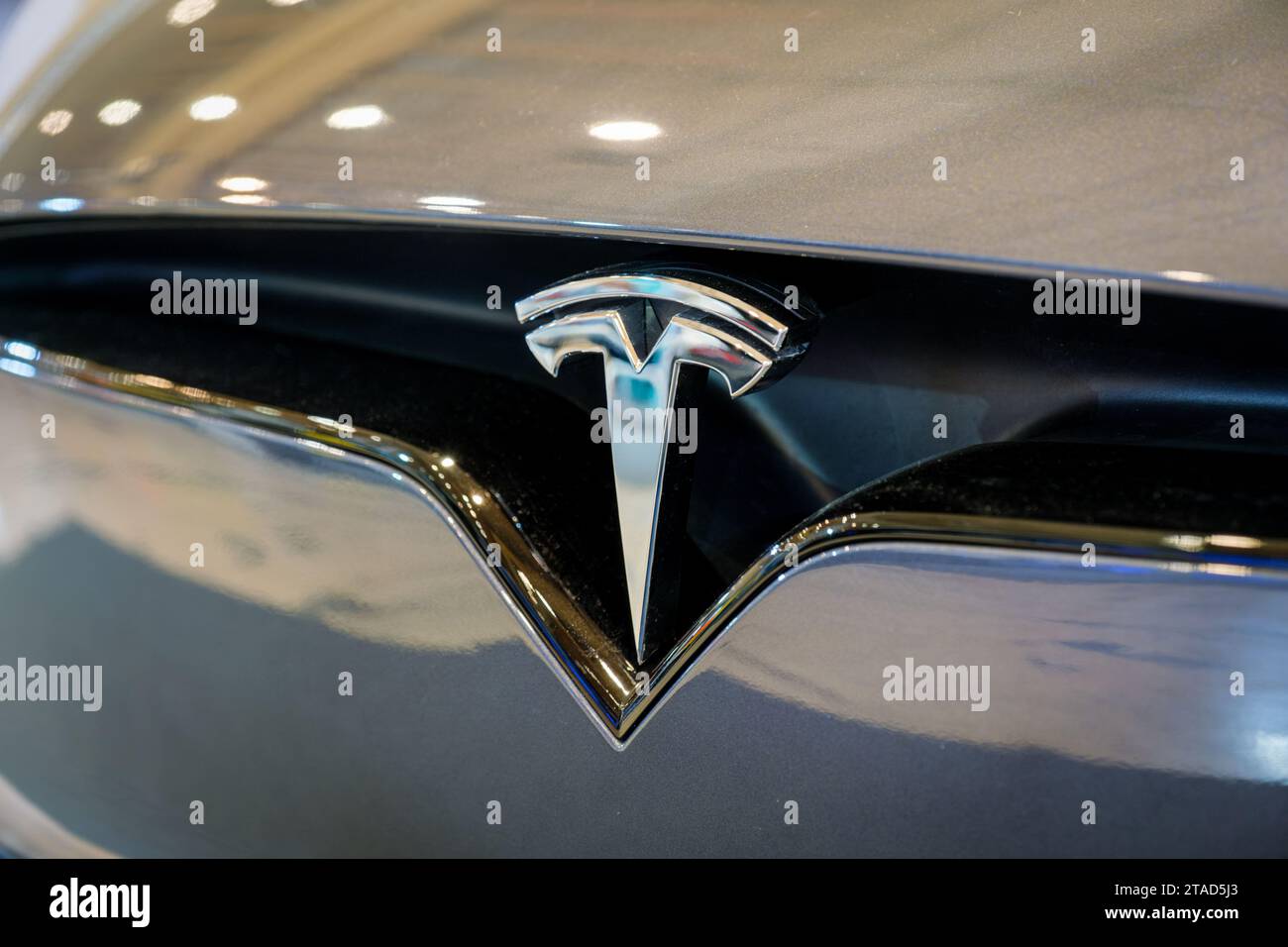 Tesla electric car logo emblem close up Stock Photo - Alamy