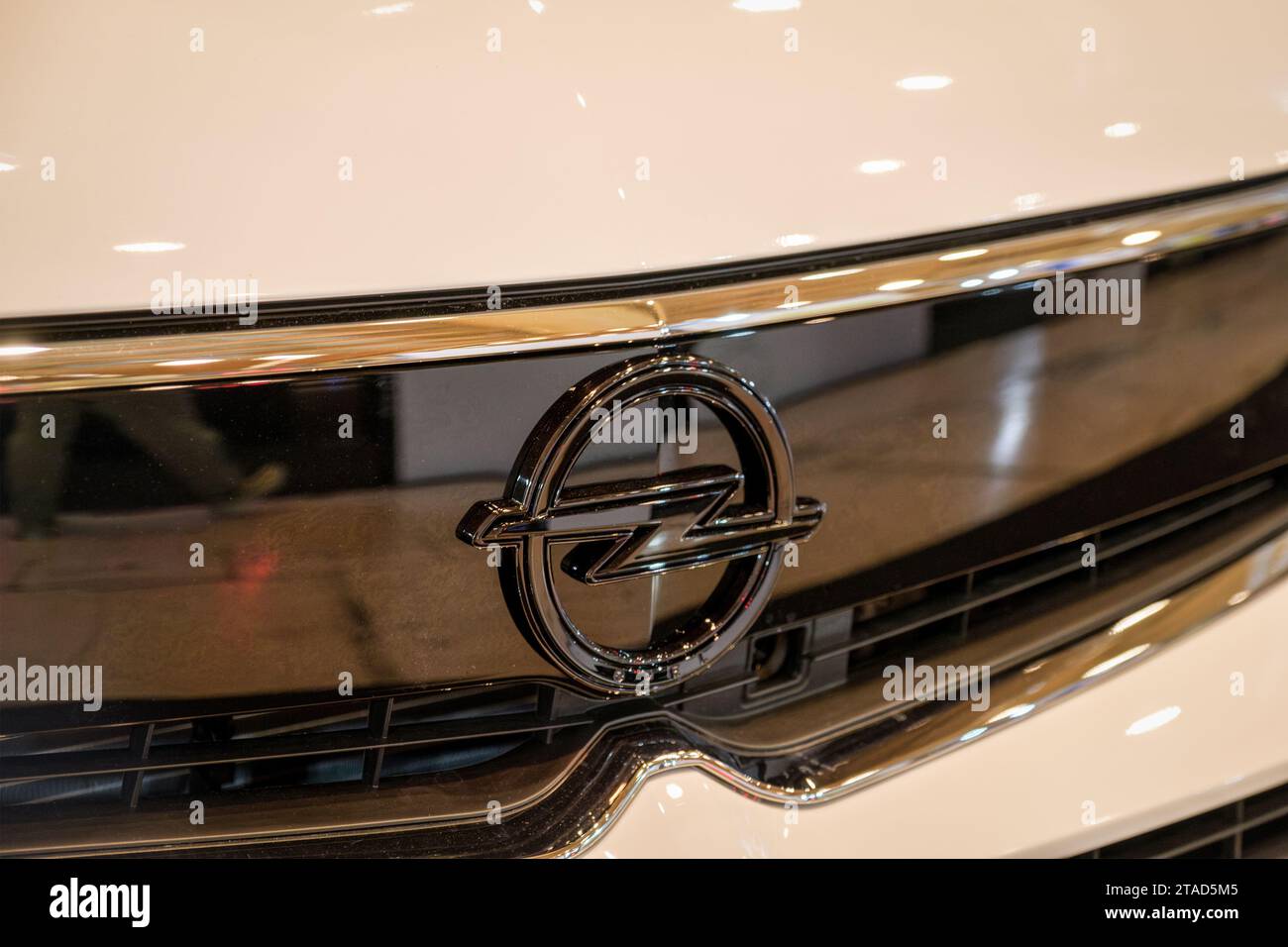Opel electric car logo emblem close up Stock Photo - Alamy