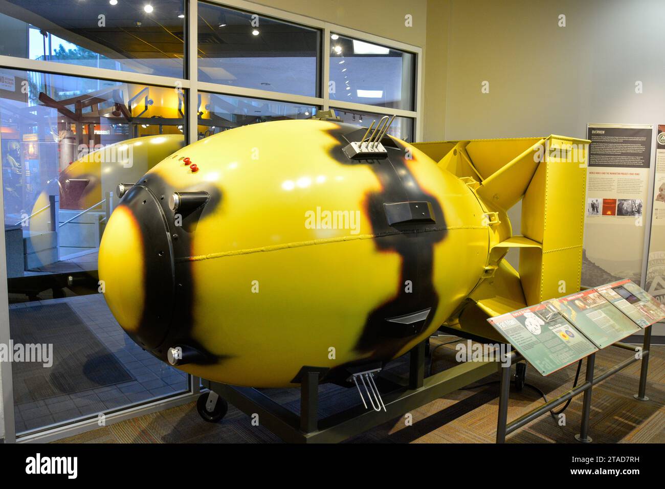 A mock-up of the Fat Boy atomic bomb against a stark white background ...