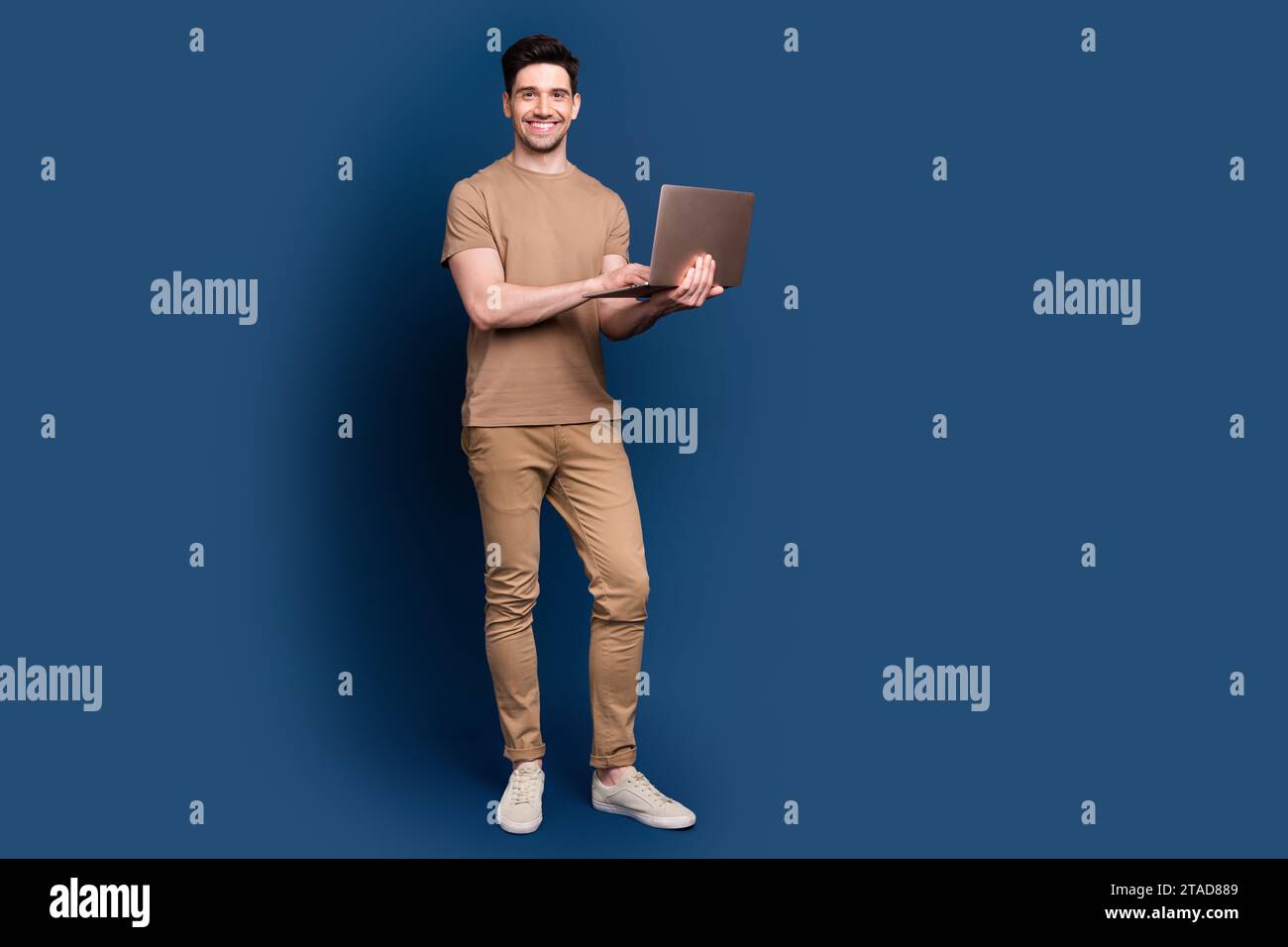 Full length photo of intelligent smart man wear beige outfit stylish ...