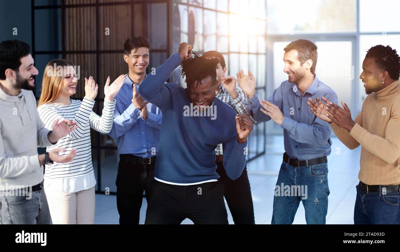 happy excited millennial employees shouting for joy, raising hands for ...