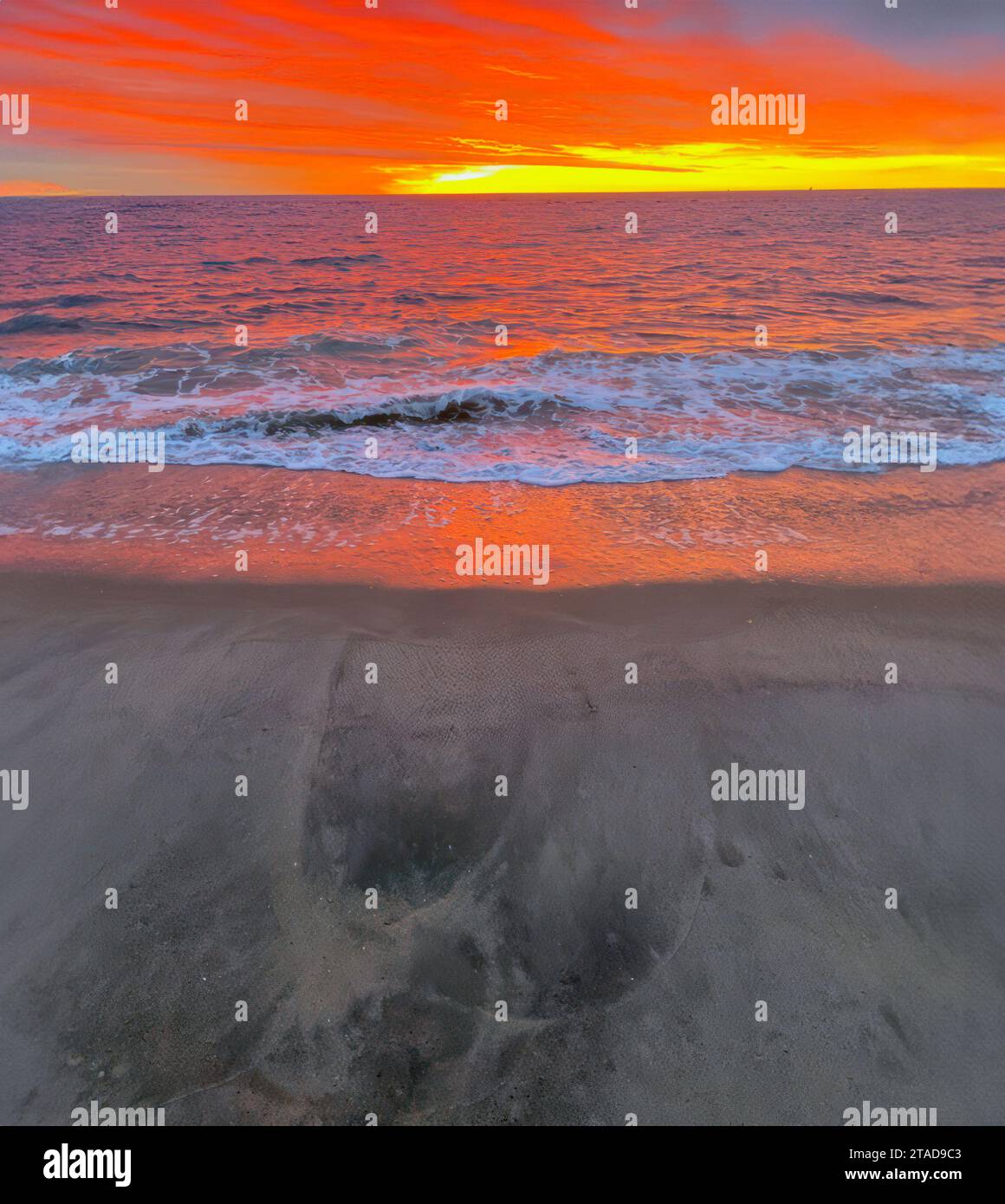 An incredible sunrise over ocean at dawn as sun rises into sky Stock ...